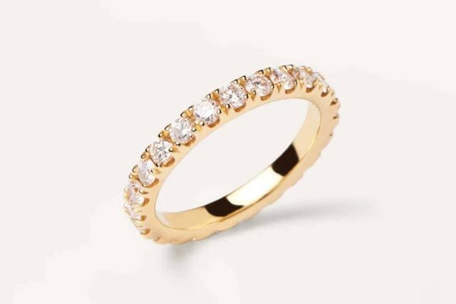 In a pavé diamond ring setting small diamonds lined across the band ...